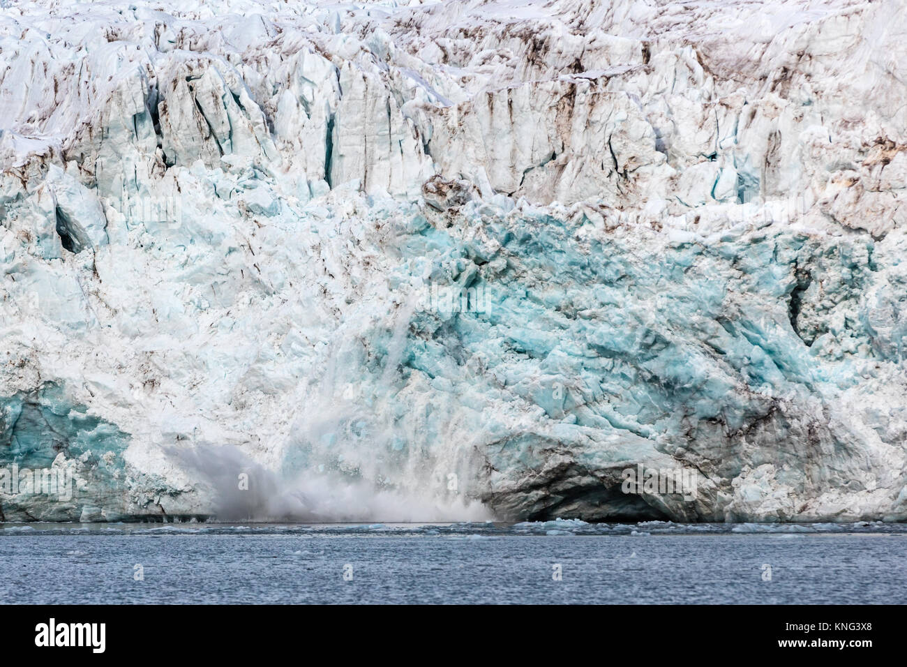 Calving ice of a massive glacier at Svalbard Stock Photo - Alamy