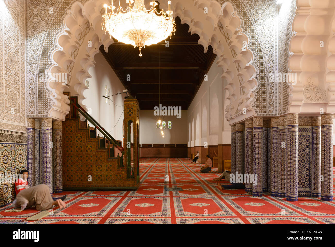 People praying in a moque Stock Photo - Alamy