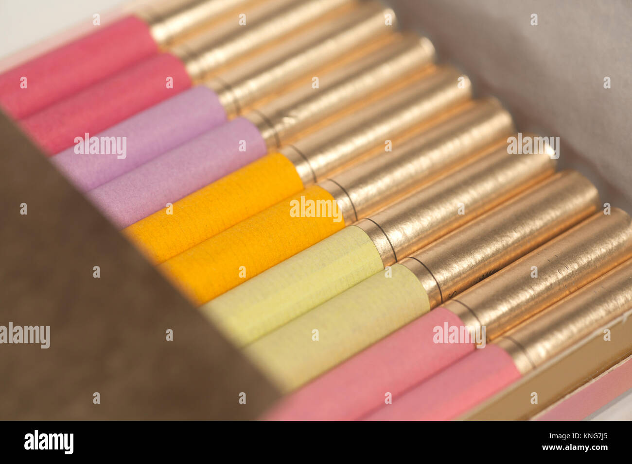 Box of colorful cigarettes close up Stock Photo - Alamy