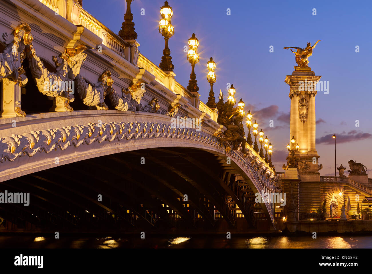 Close-up of Pont Alexandre III Bridge and illuminated lamp posts at ...