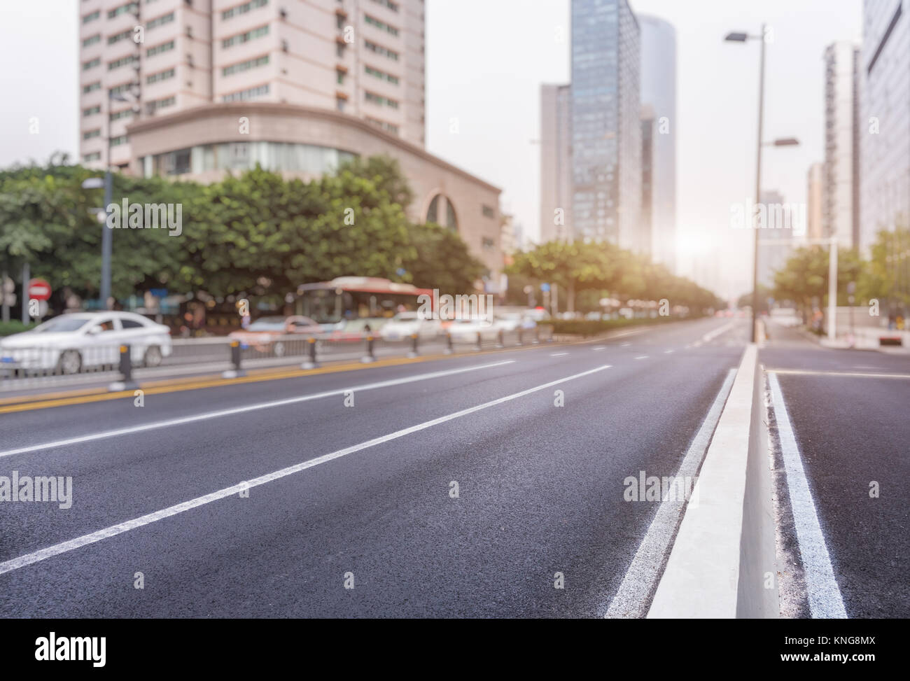 empty asphalt road through modern city in China Stock Photo - Alamy