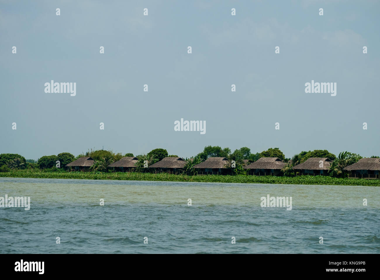 Thatched Houses along the Mekong River Stock Photo - Alamy
