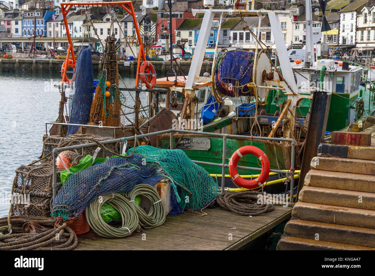 Fishing boat moored at Brixham Harbour with equipment on the ...