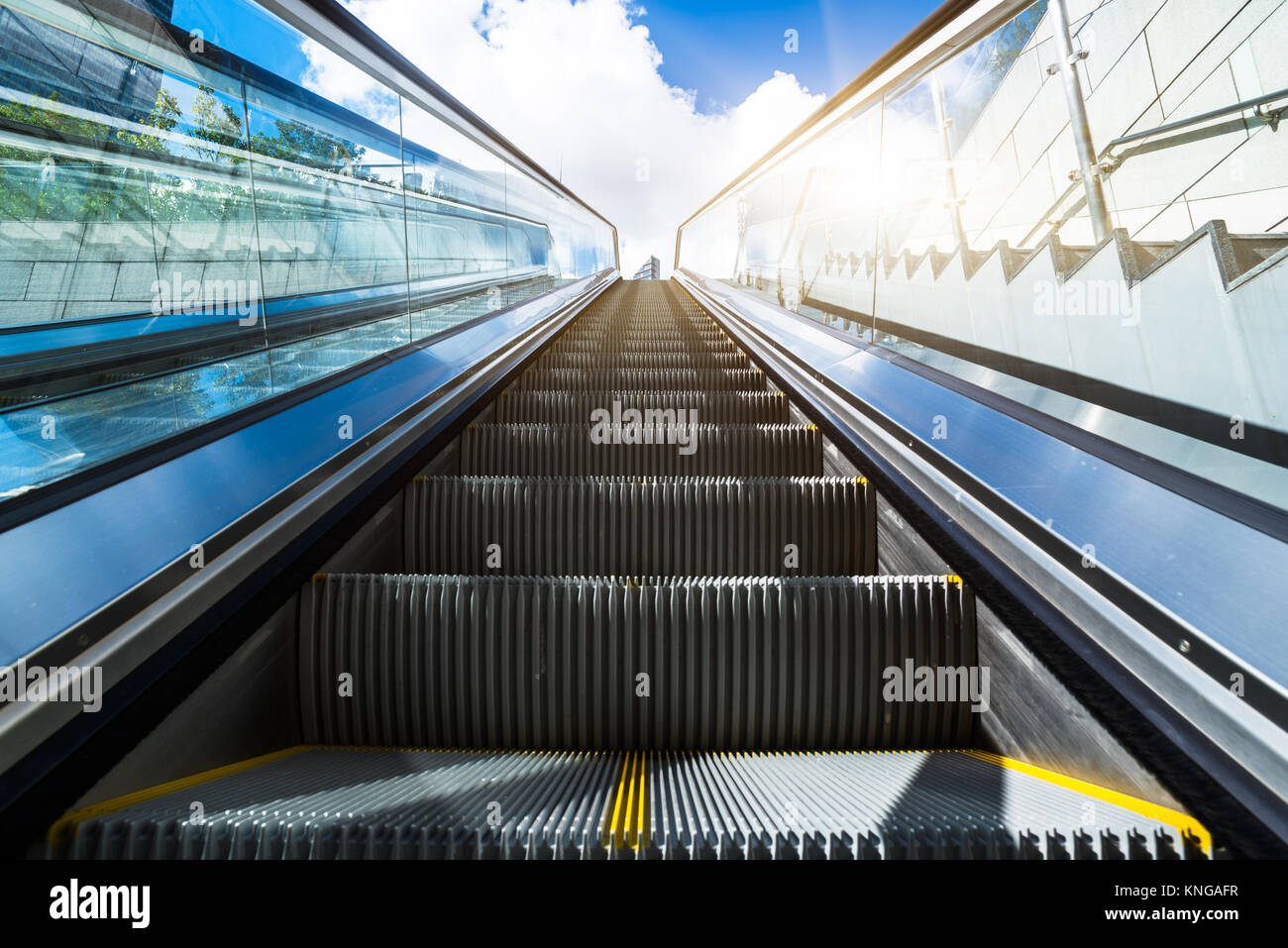 Escalator in an underground station with skyline in background Stock ...