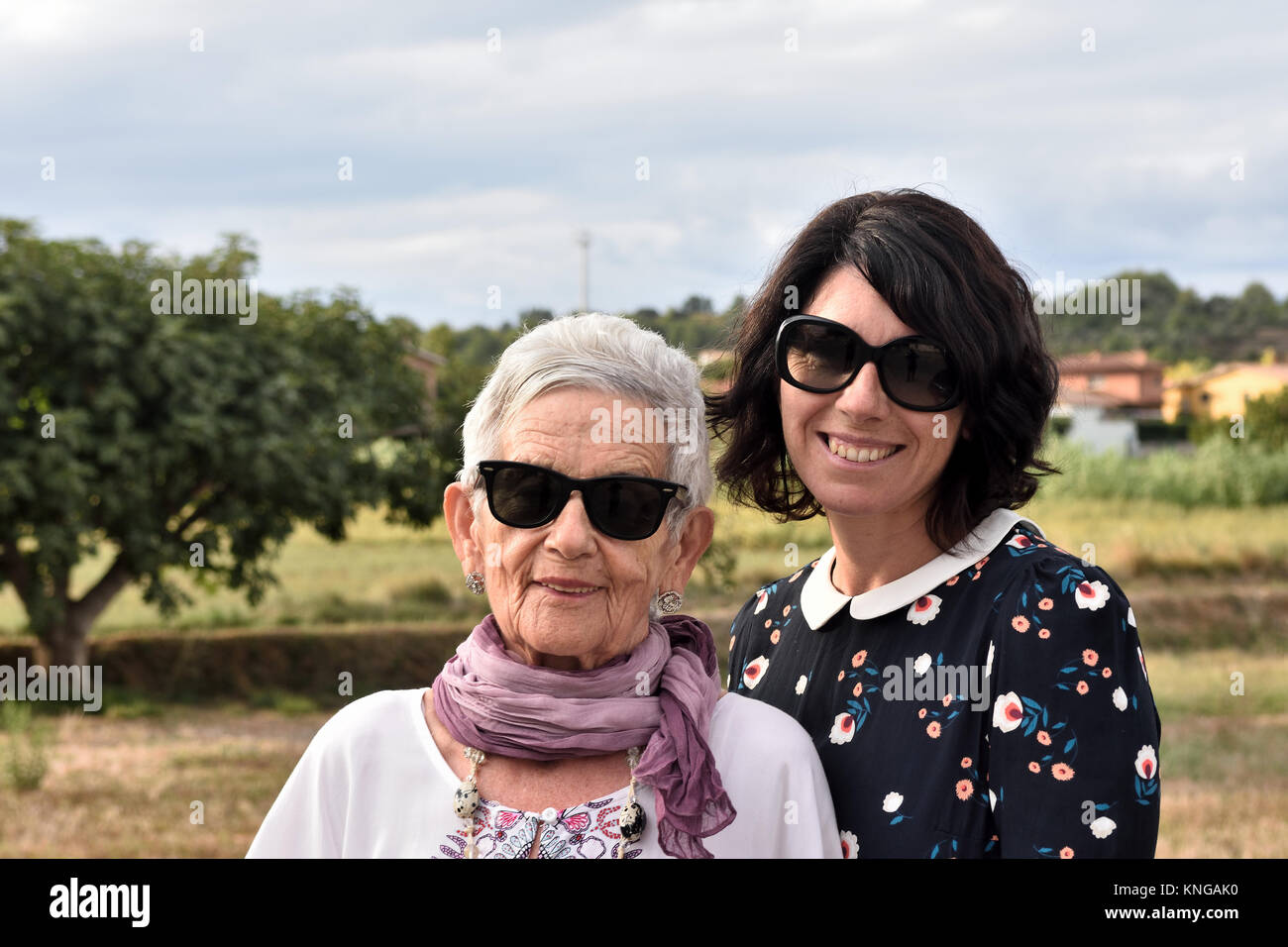 portrait of two women outdoors Stock Photo - Alamy