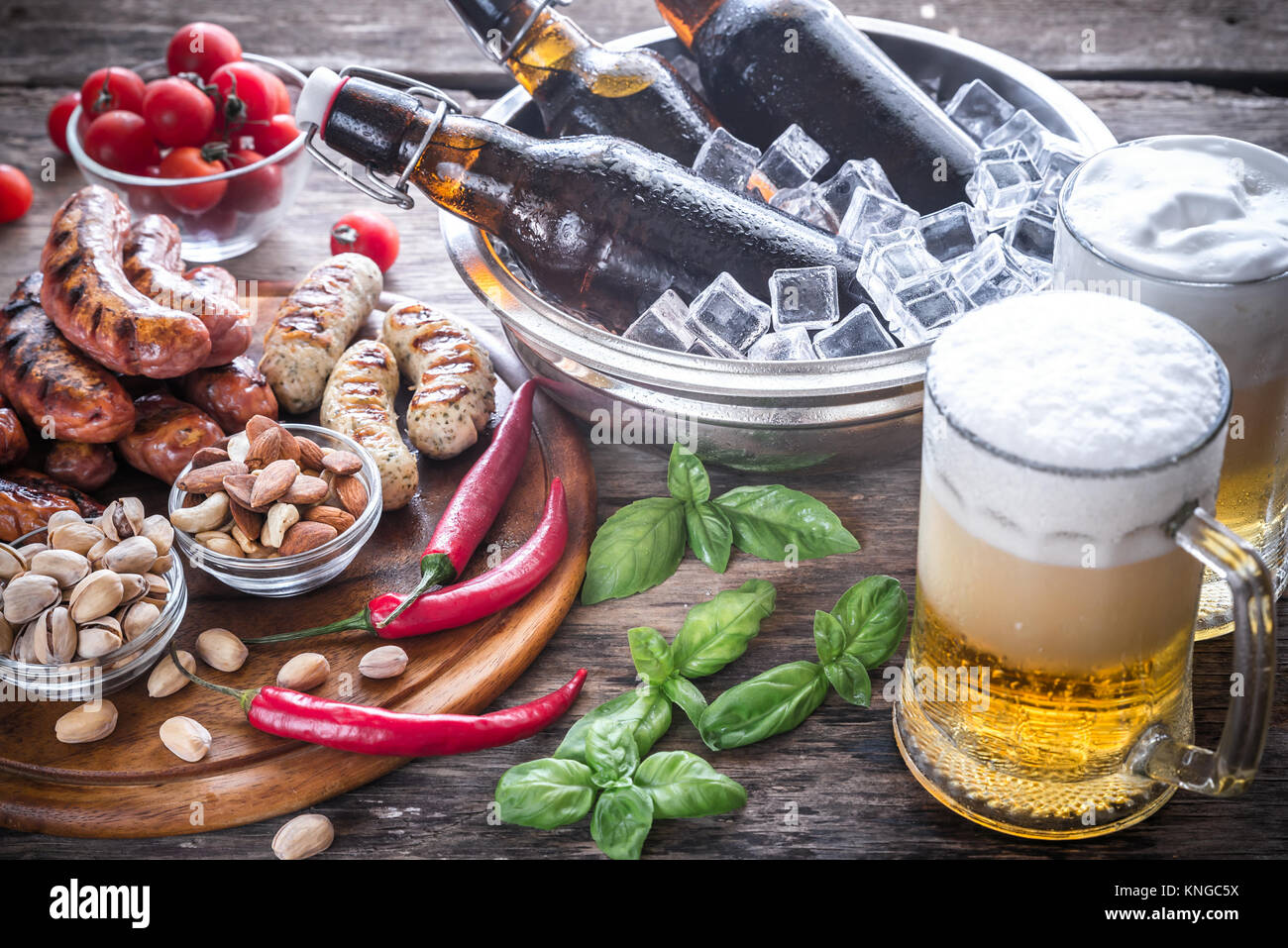 Appetizers and mugs of beer Stock Photo - Alamy