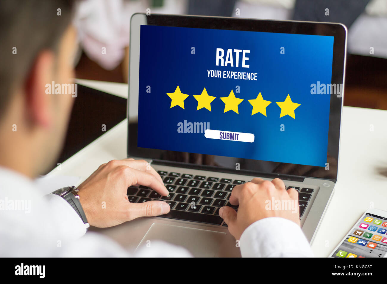 businessman rating an experience, product or service with a laptop, All ...