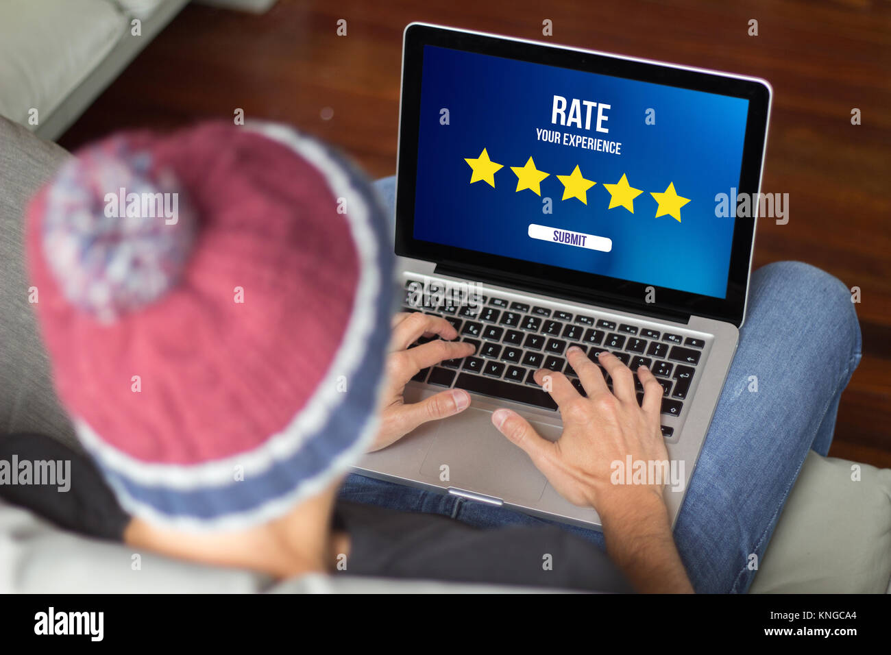 young man rating an experience. All screen graphics are made up Stock ...