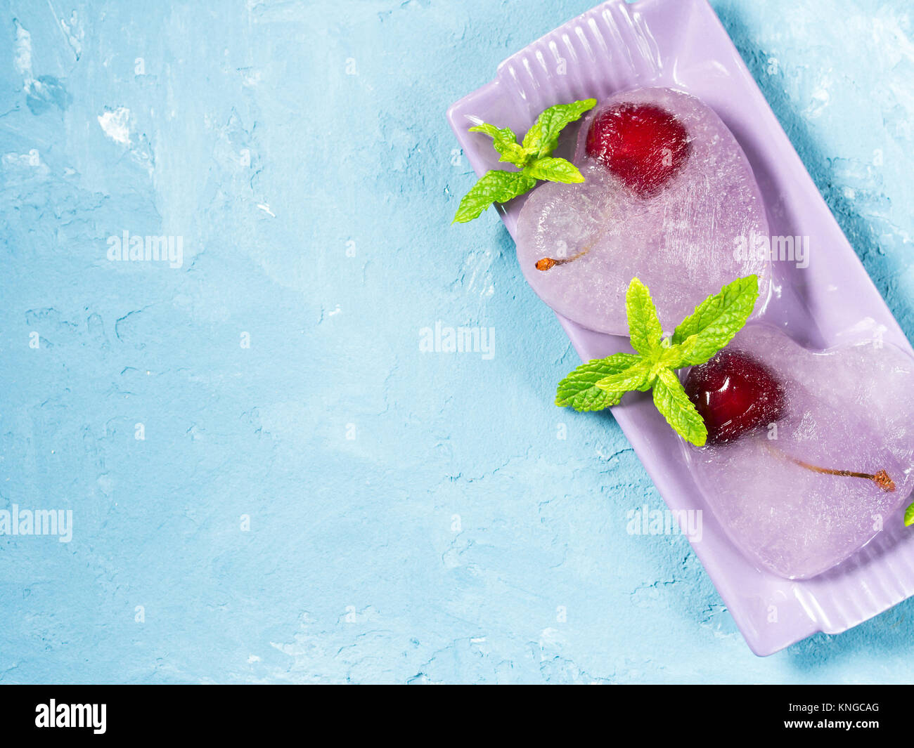 Summer blue textured background ice hearts frozen cherries Stock Photo ...