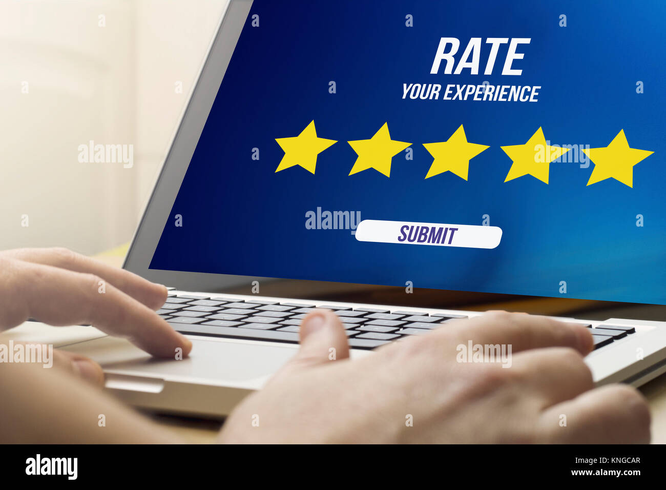 online scoring concept: man using a laptop with rating interface on the ...