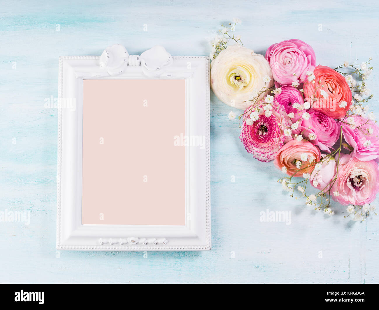 Beautiful buttercup frame on turquoise wooden background. Woman mother ...