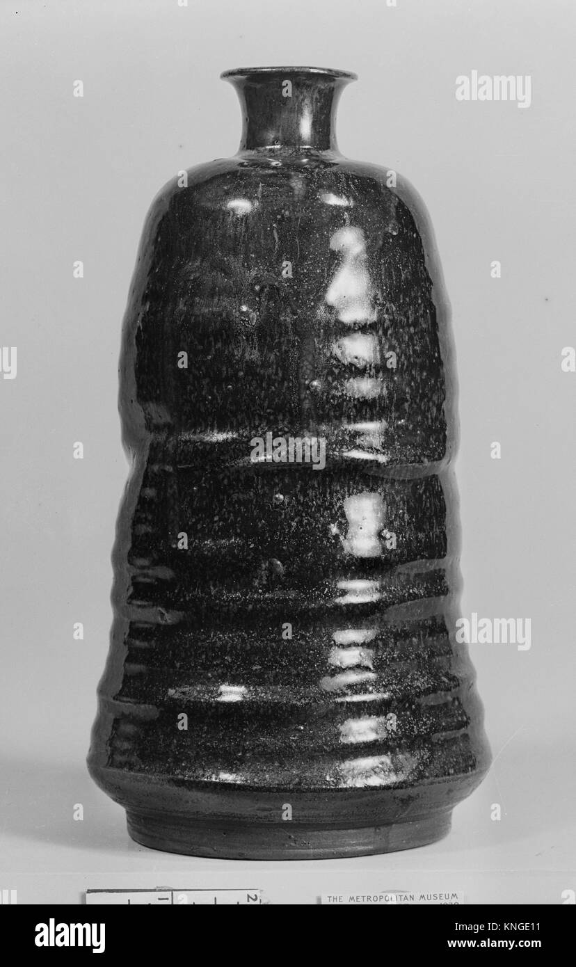 Clay with dark brown mottled glaze hi-res stock photography and images ...