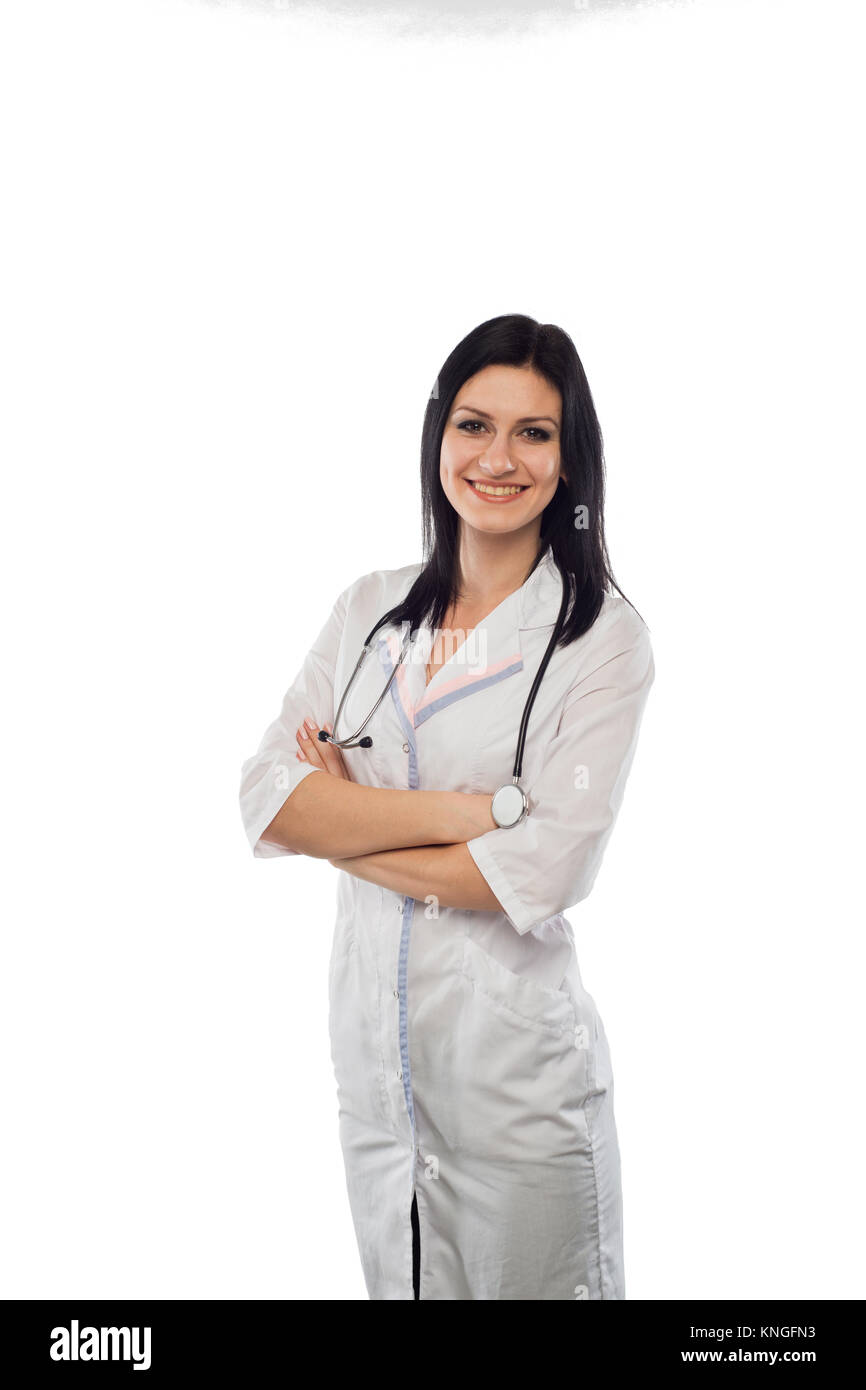 a young doctor, folded his hands, in a doctor`s overall Stock Photo - Alamy