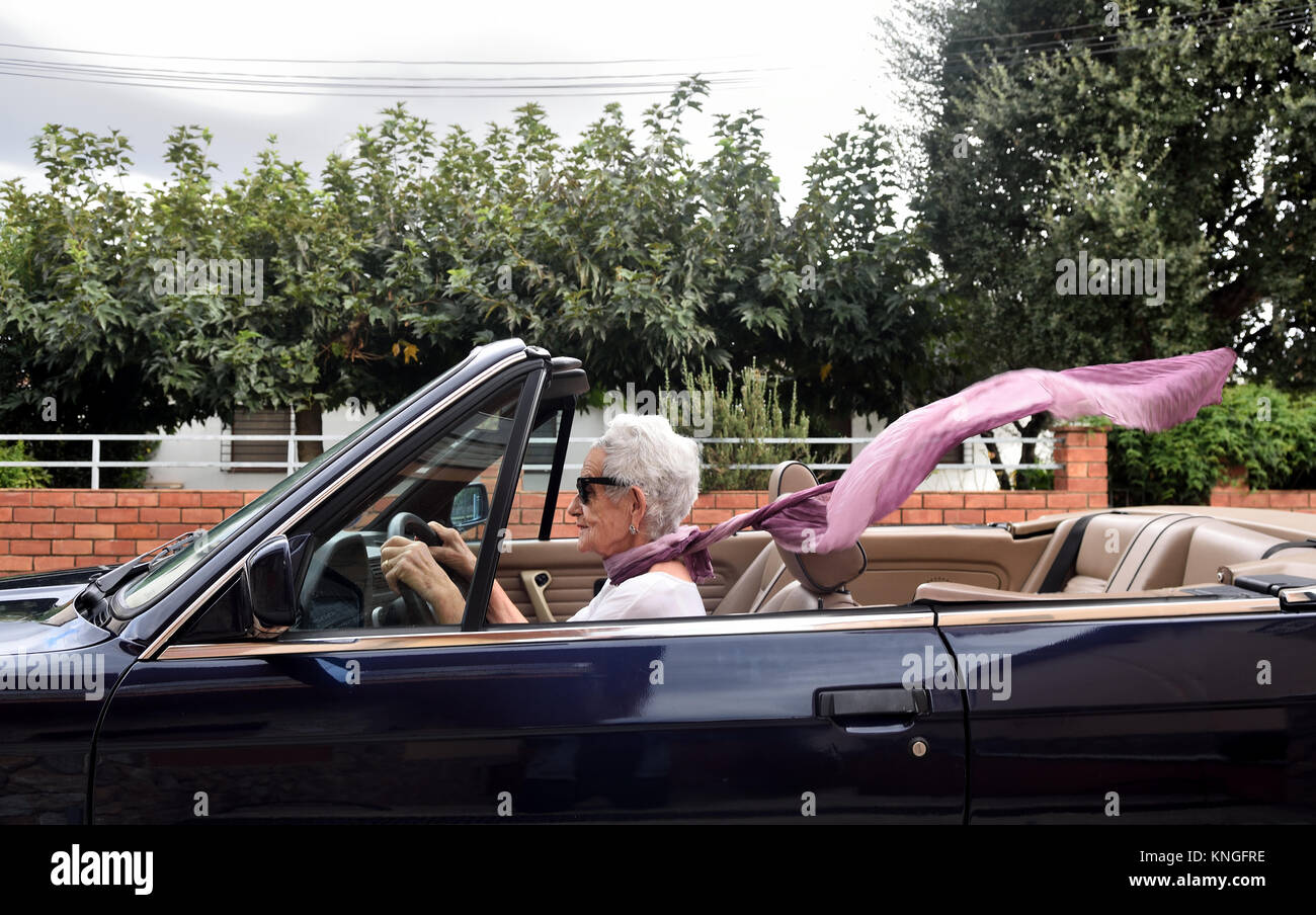 old woman driving a convertible car Stock Photo - Alamy