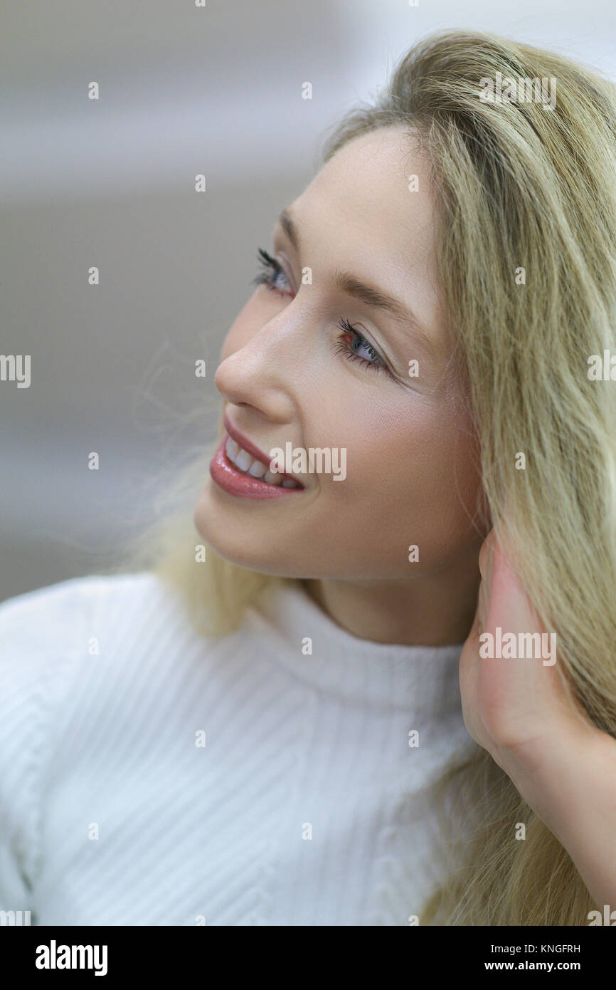 Soft focus profile portrait of girl listening attentively Stock Photo ...
