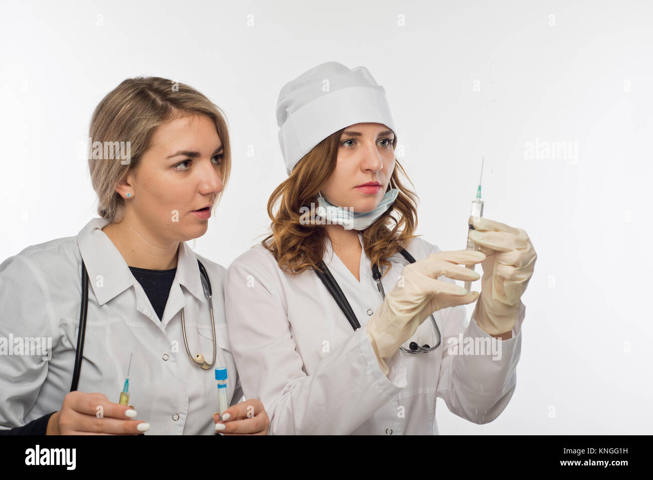 Preparation for giving an injection under an instructor`s control Stock ...