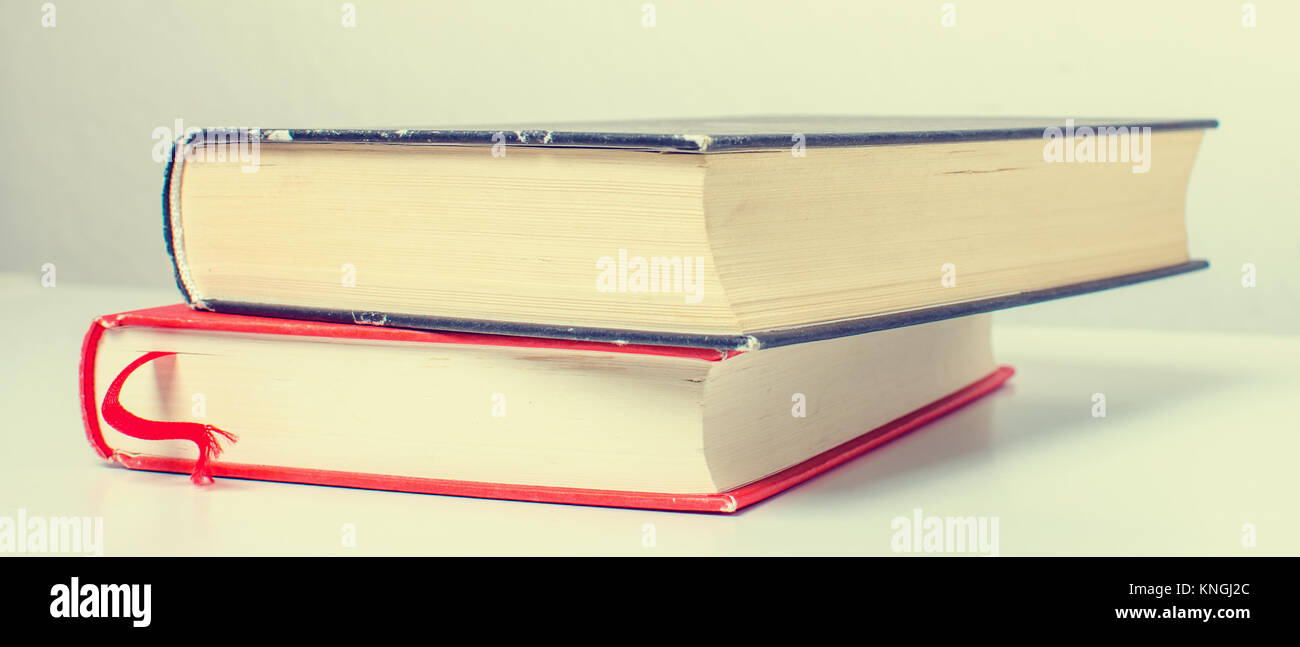 A pile of old, discarded books suited to learning Stock Photo - Alamy