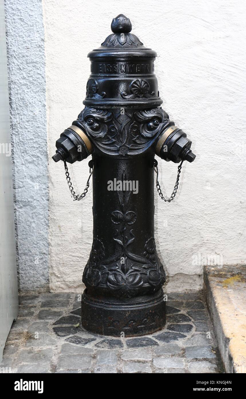 ancient hydrant, handmade ironwork Stock Photo - Alamy