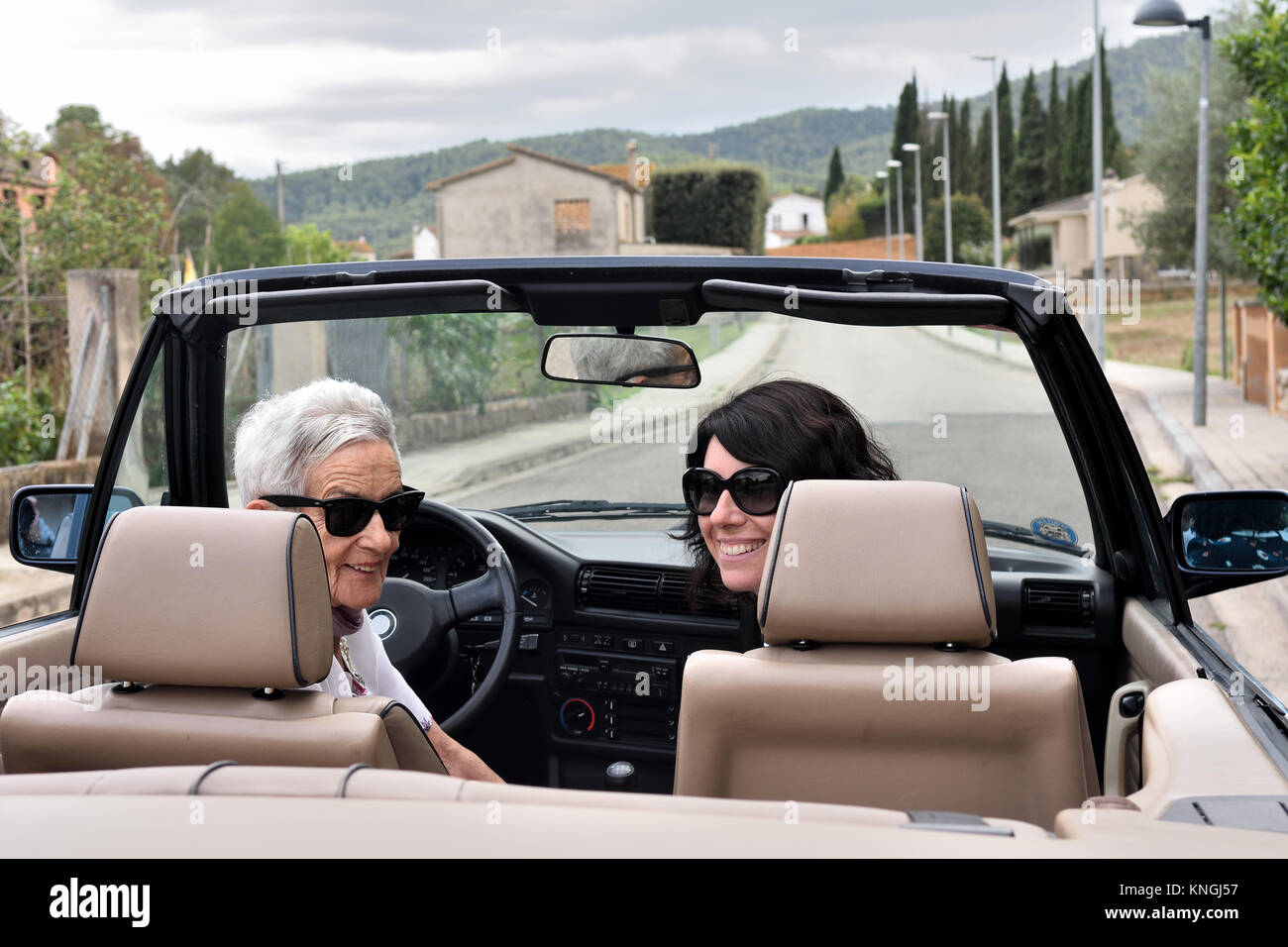 Back view two young women convertible hi-res stock photography and ...