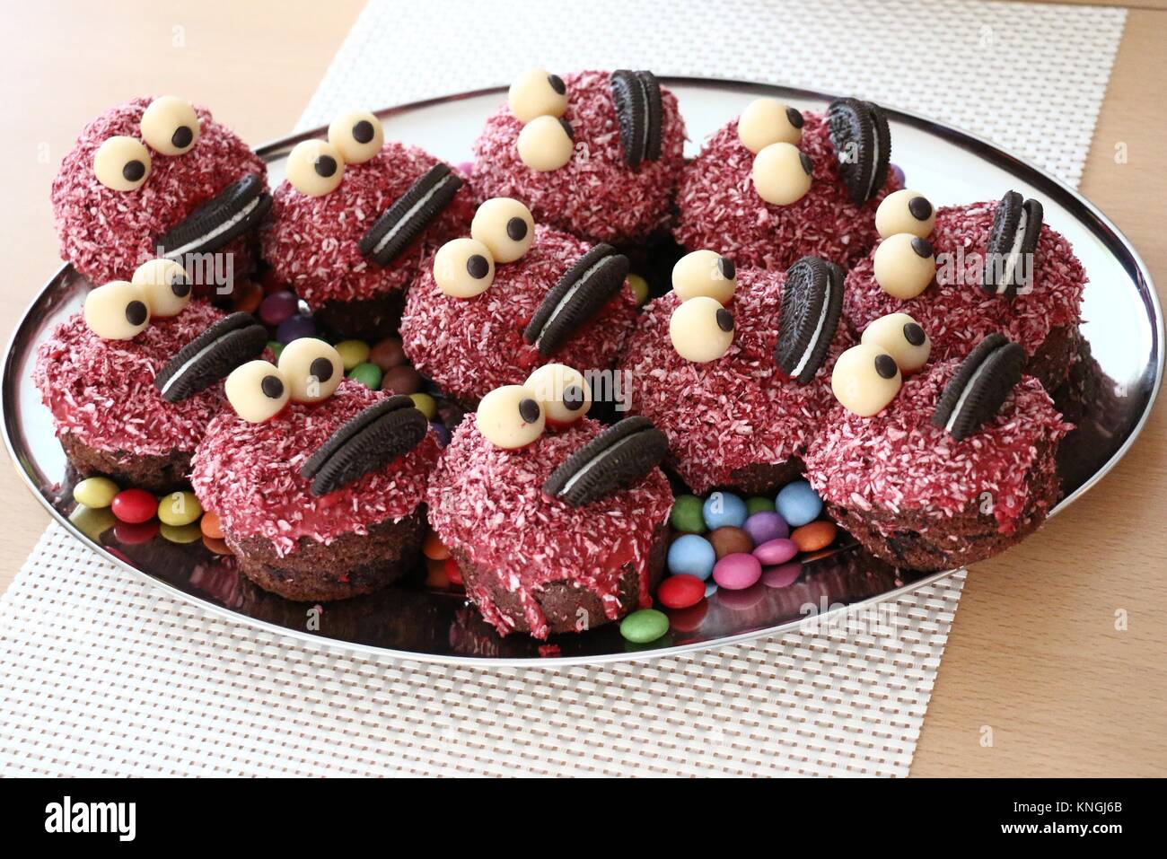 Group of Muffins dressed up as a Monster Family with big eyes and big ...