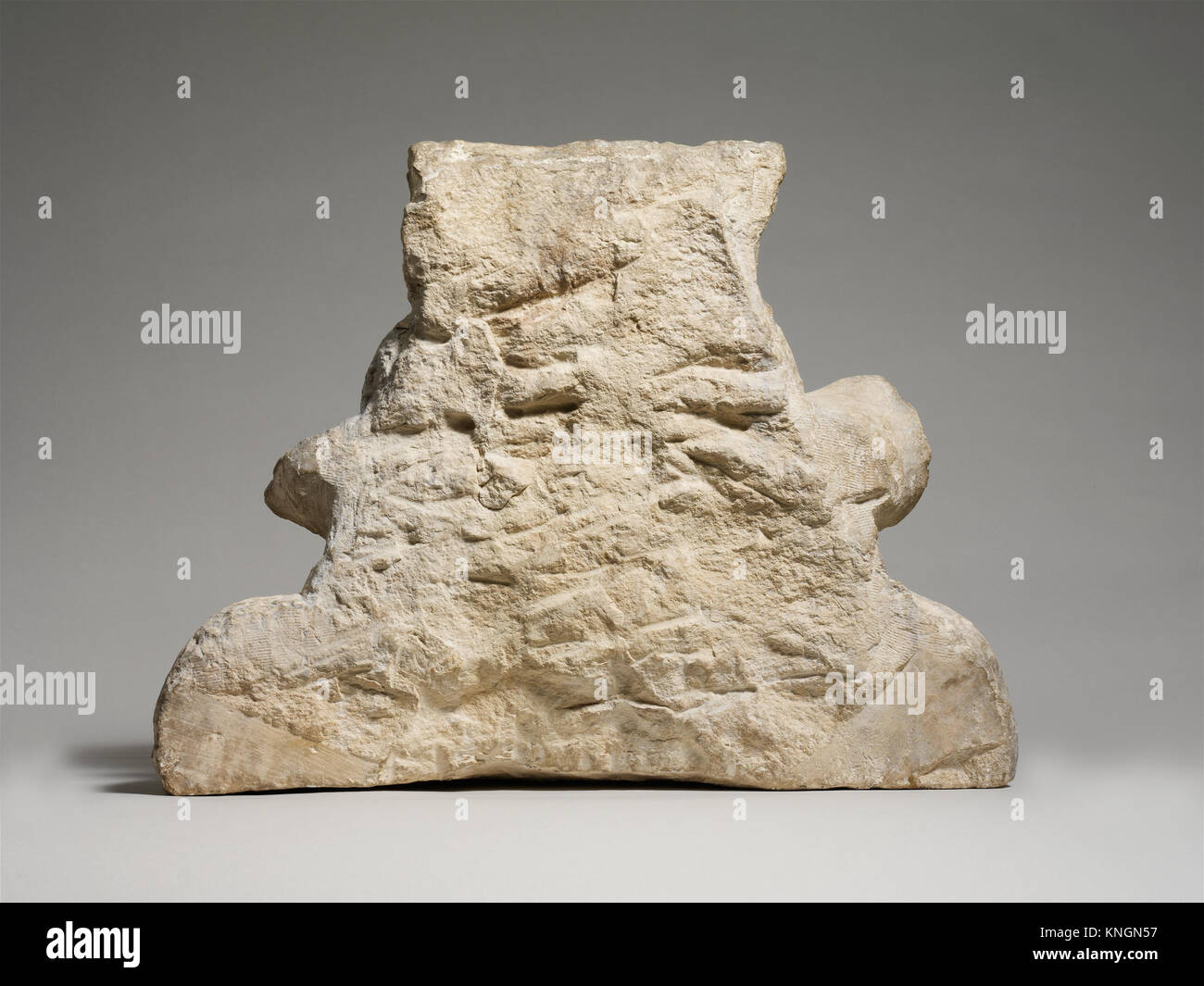 This column capital features a Bes image, representing Egyptian ...