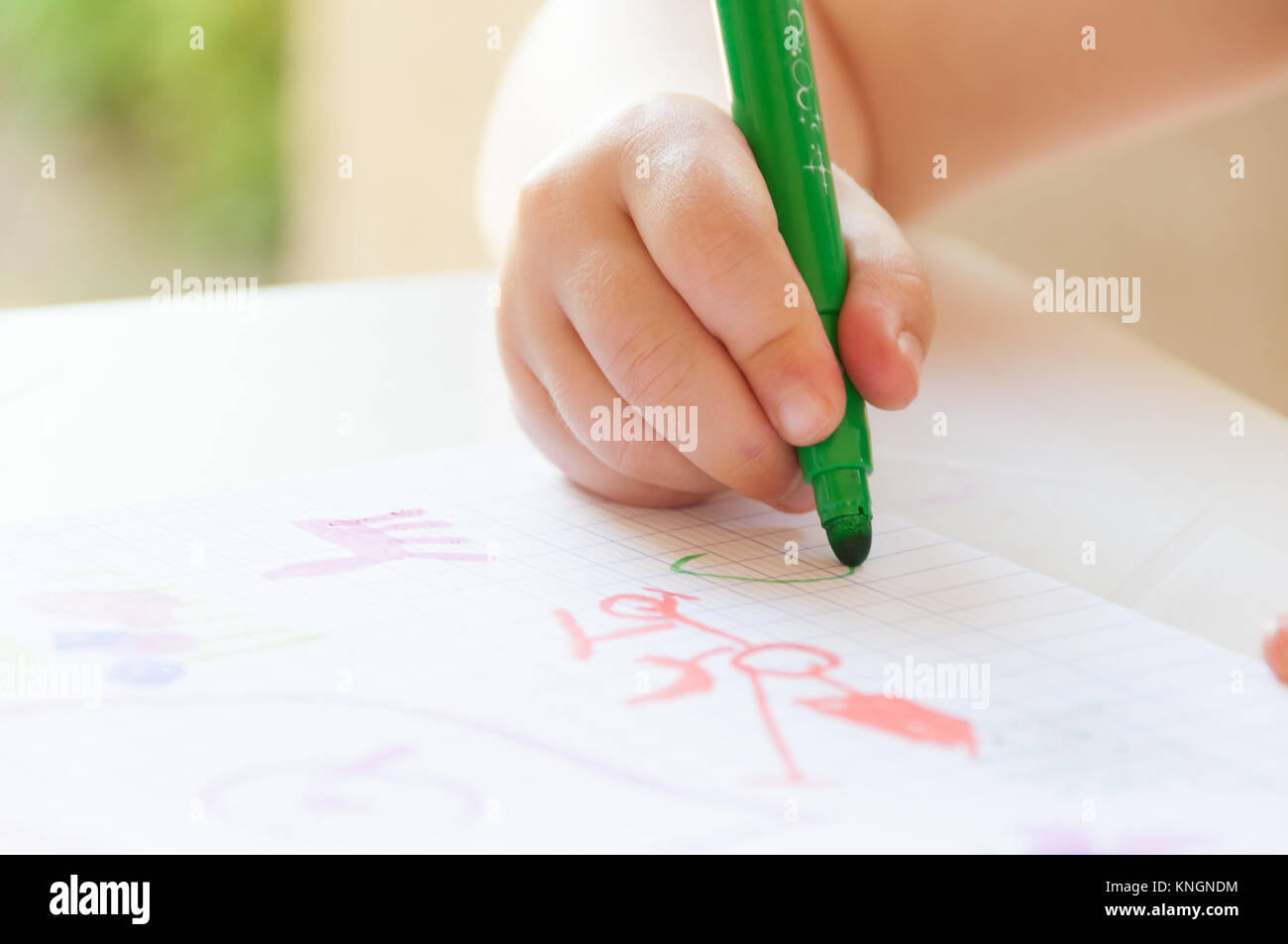Hand of child drawing with pencil Stock Photo - Alamy