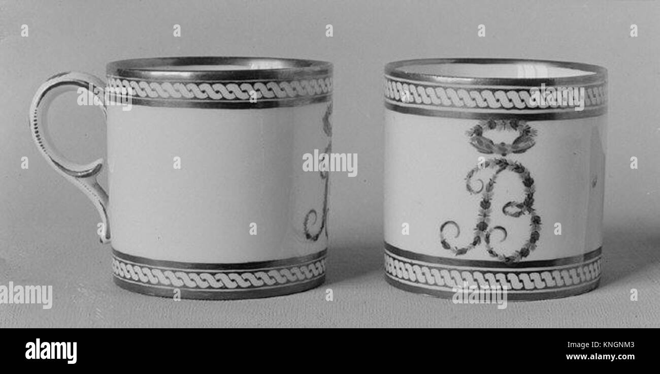 A cup from a traveling tea service, one of a pair designed for mobility ...