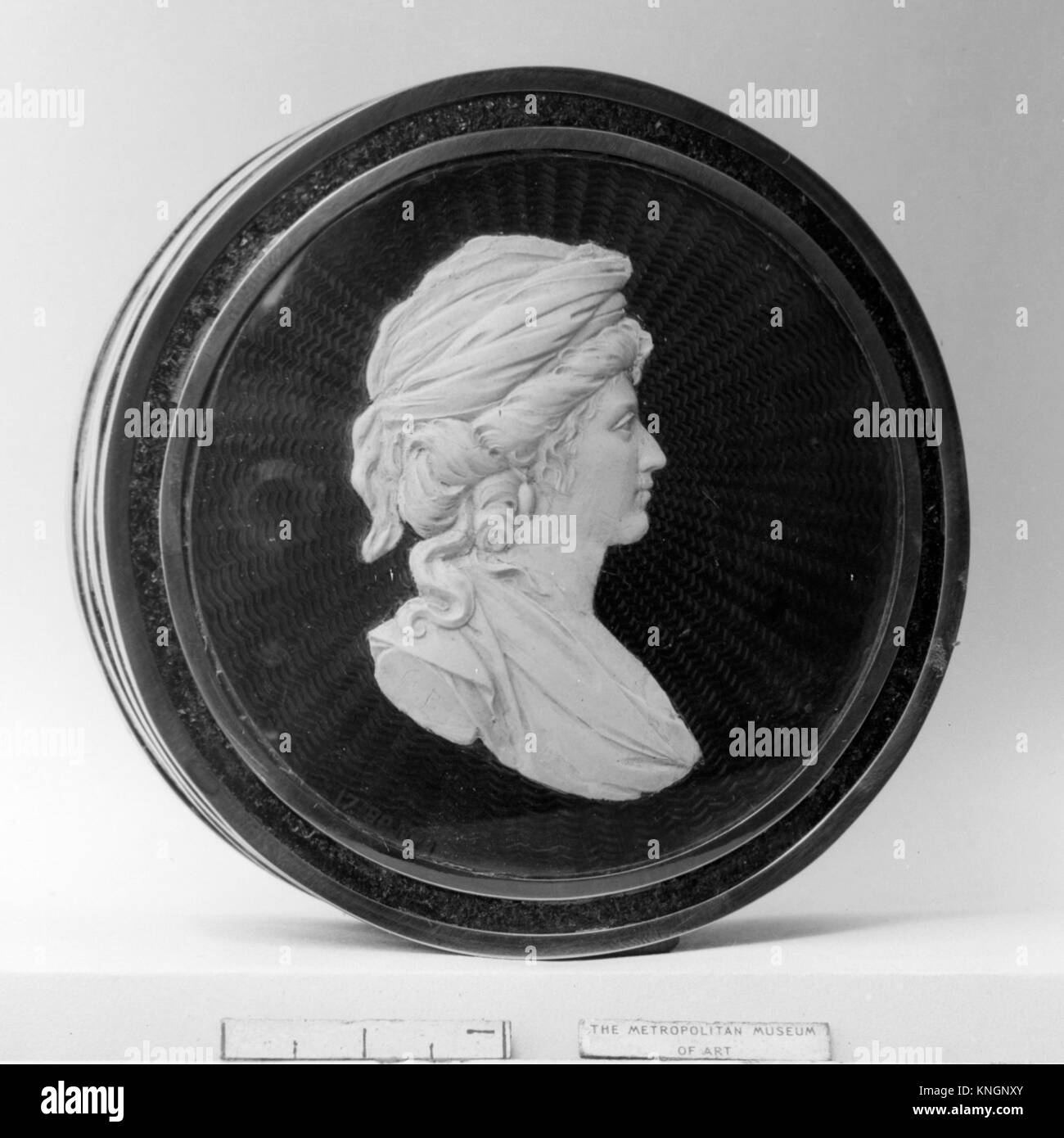 This decorative box, made from fine materials, showcases intricate ...