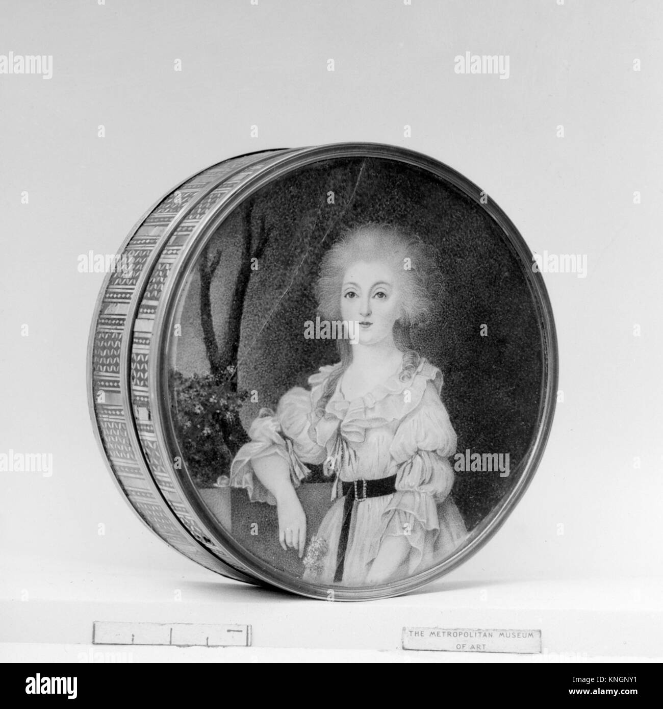 This box features a portrait of a woman, reflecting the decorative art ...