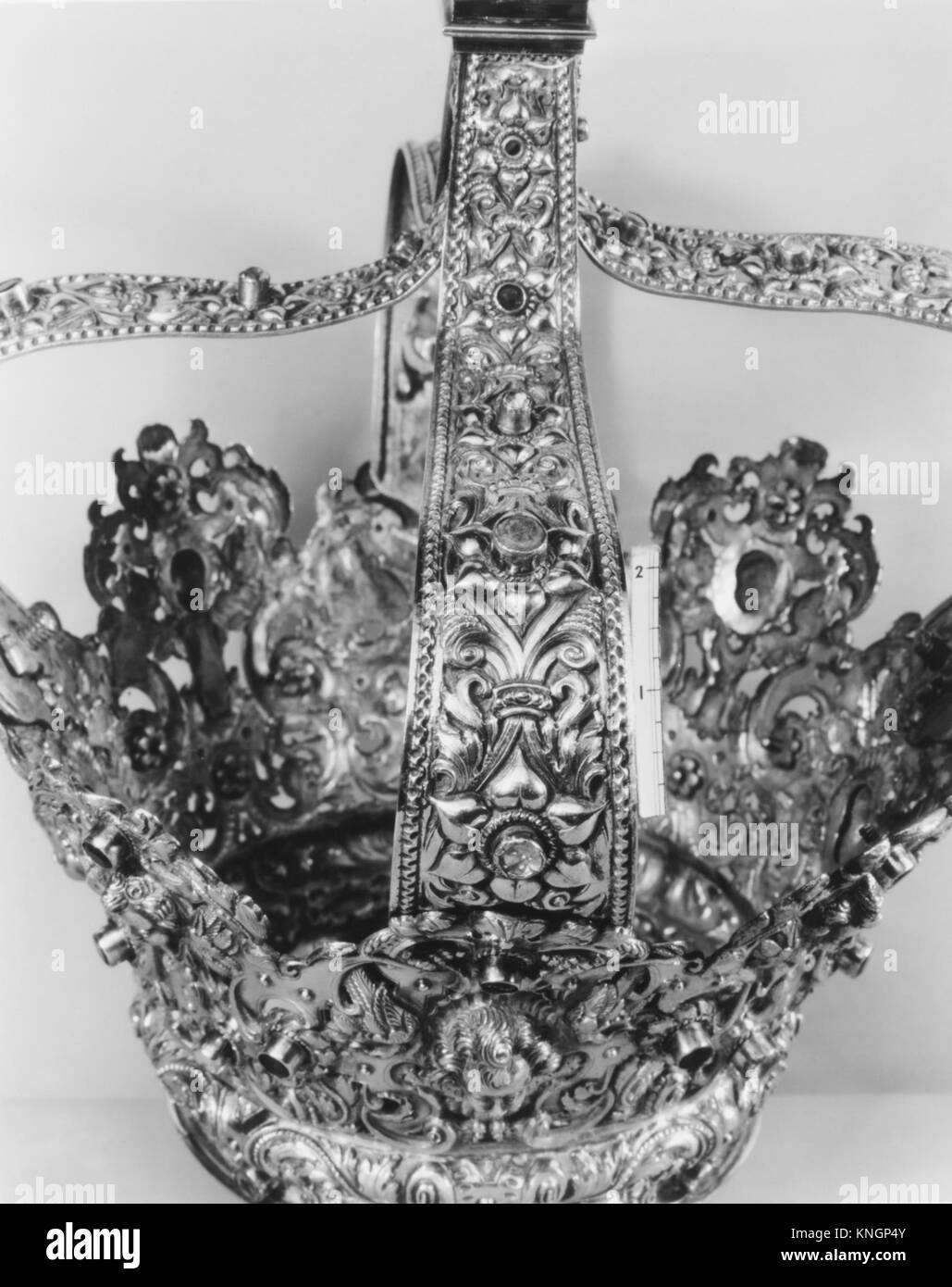 This crown, part of a larger statue, showcases intricate metalwork and ...