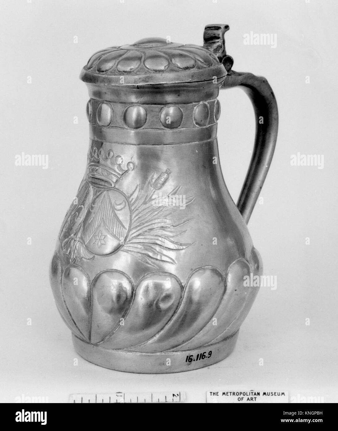 A flagon serving as a ceremonial vessel, showcasing elegant design and ...