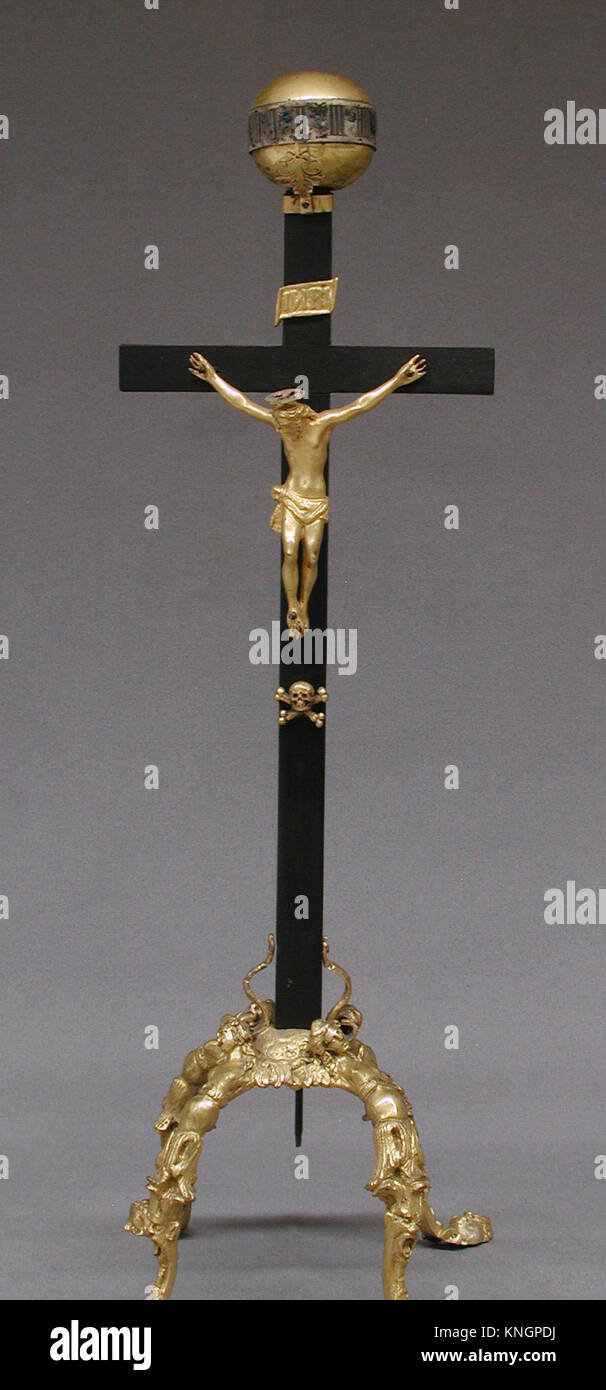 This clock, featuring a distinctive cross design, showcases the ...