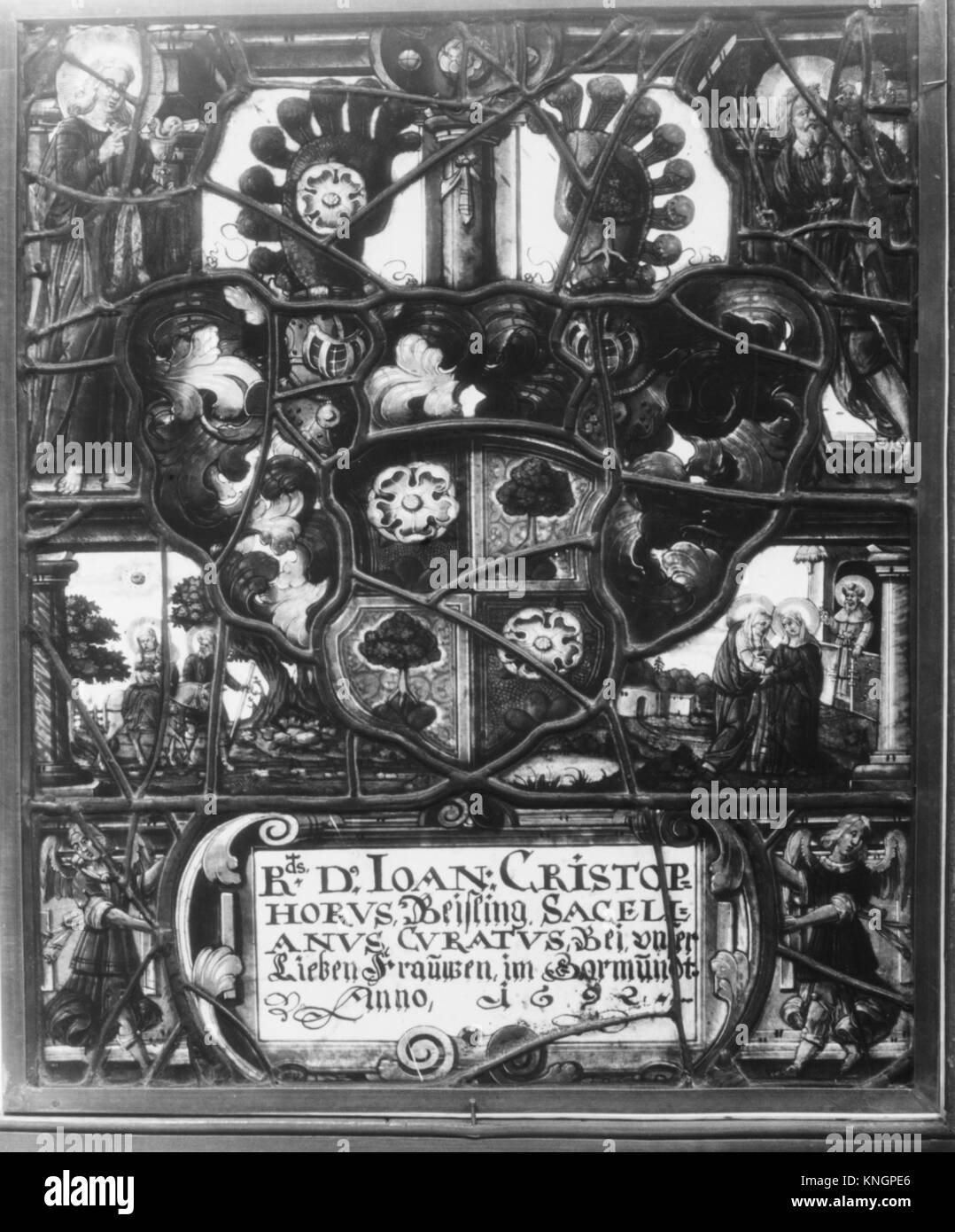 This armorial panel features heraldic designs, likely representing a ...