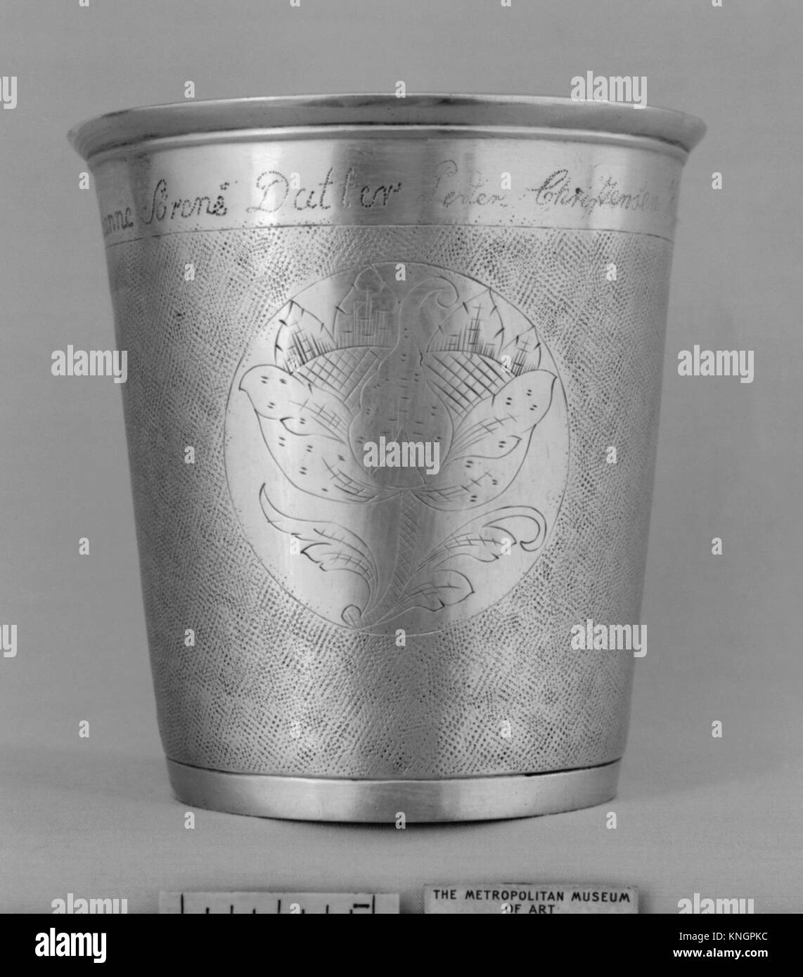 A simple beaker, part of the collection, showcasing basic craftsmanship ...