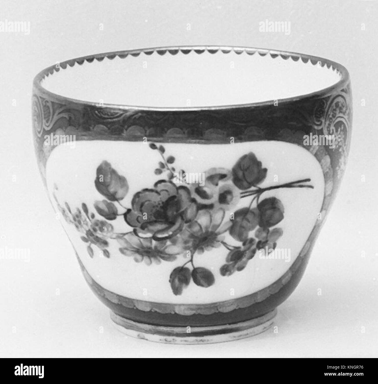 This cup is part of a service set, demonstrating intricate design and ...