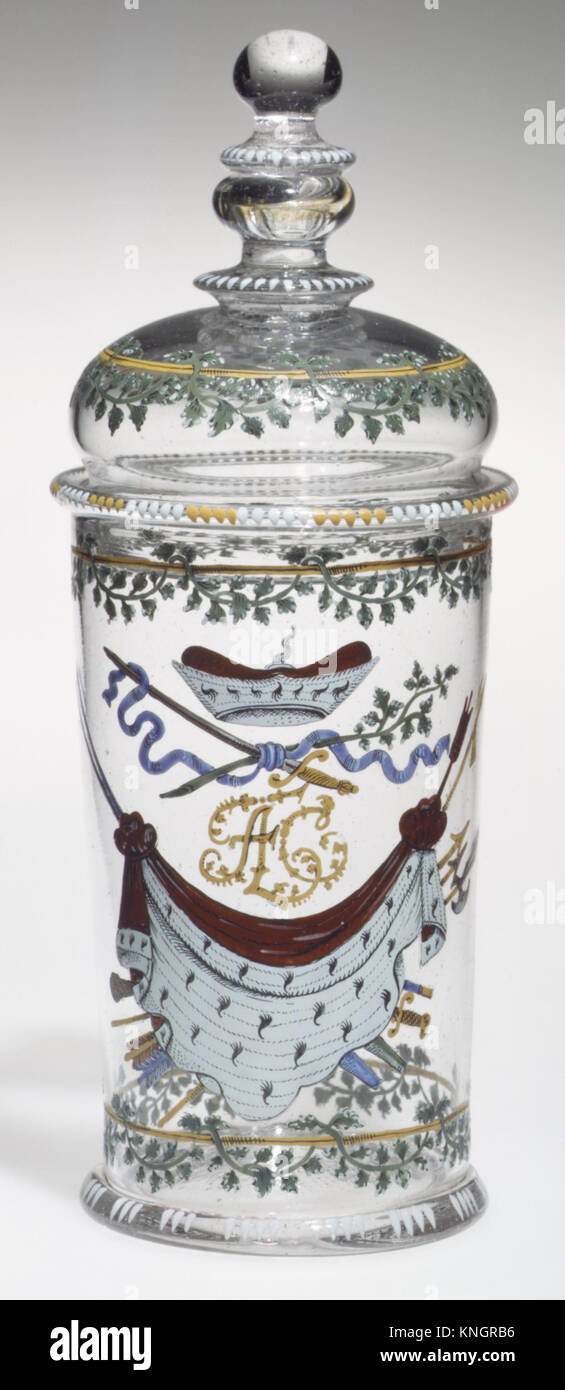 This beaker with a cover is a finely crafted vessel, designed for both ...