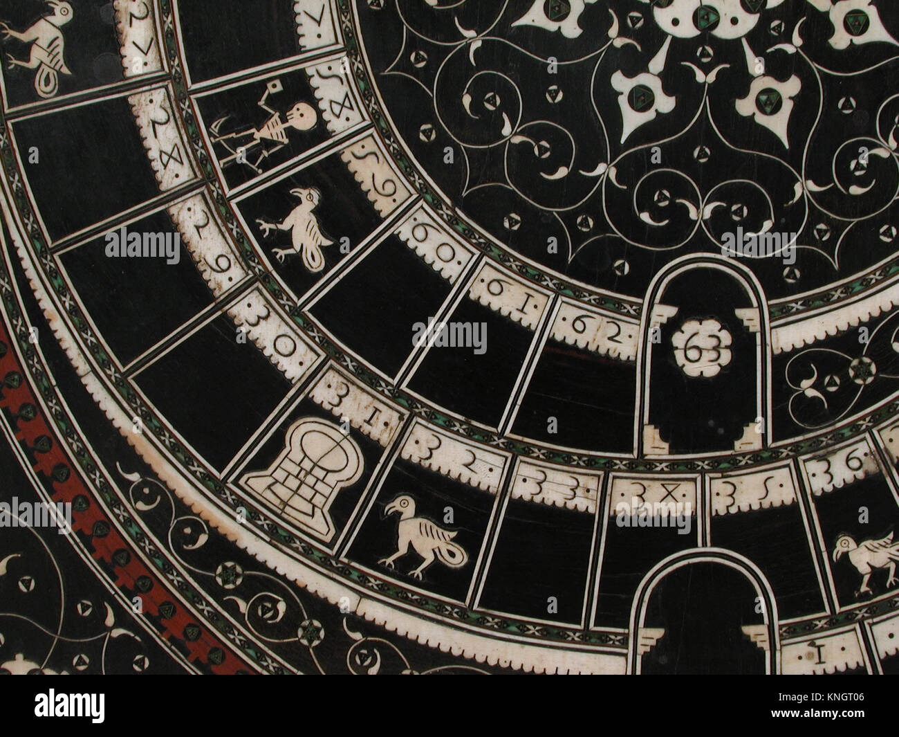 This game board features designs for both chess and the goose game ...