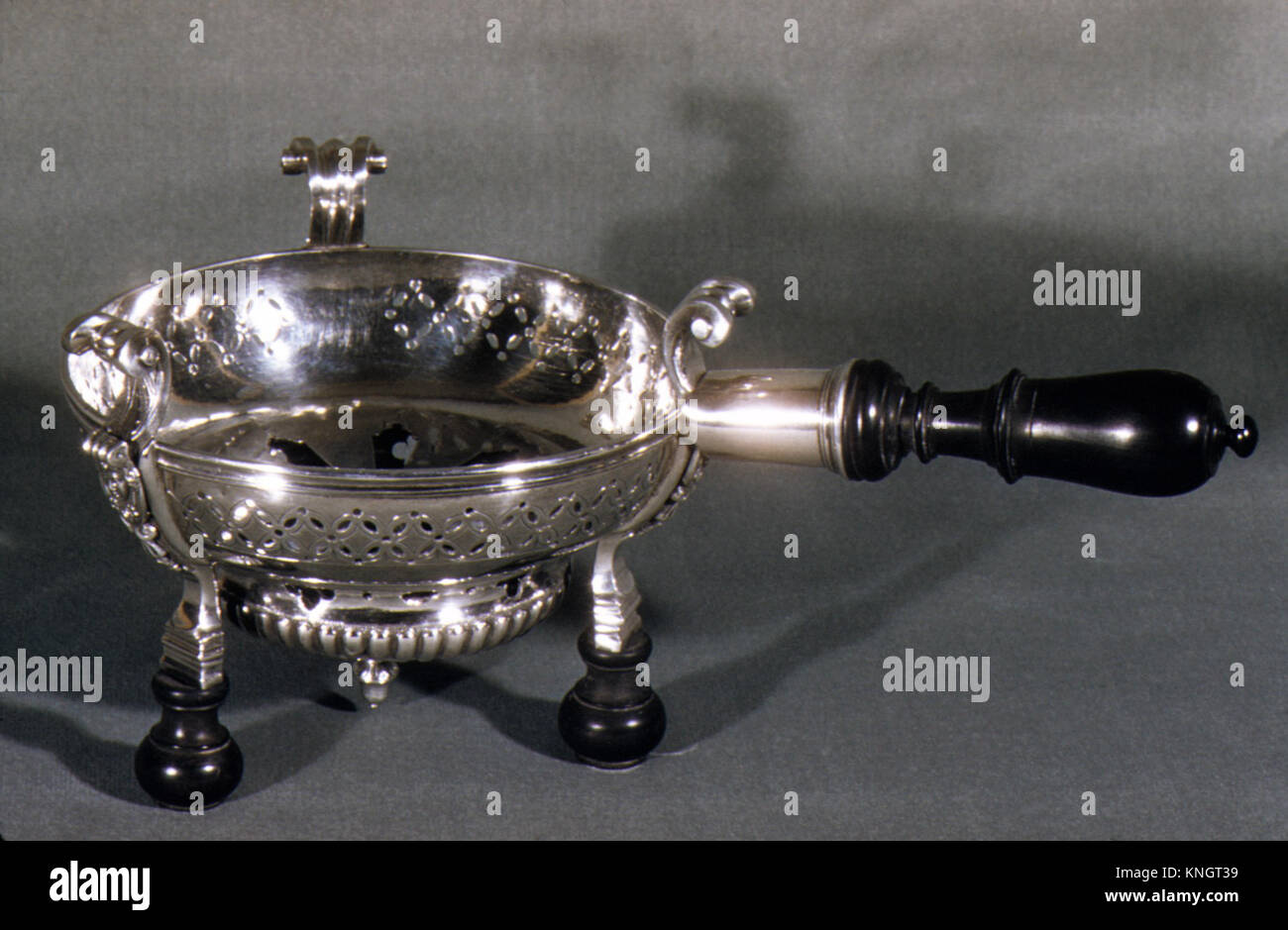 This brazier, one of a pair, represents traditional heating methods ...