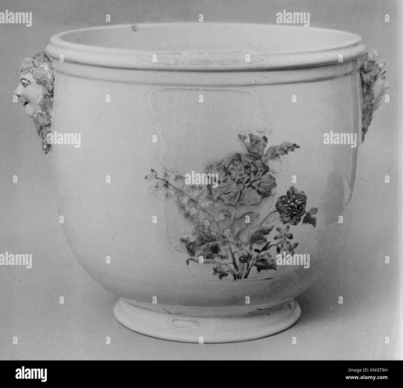 This functional yet decorative bottle cooler is an example of fine ...