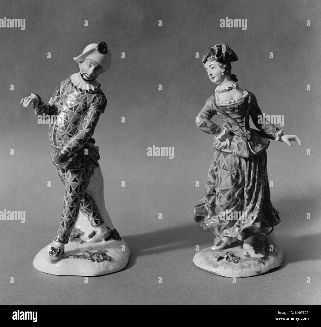 Harlequin figure, part of a pair, represents a classic theatrical ...