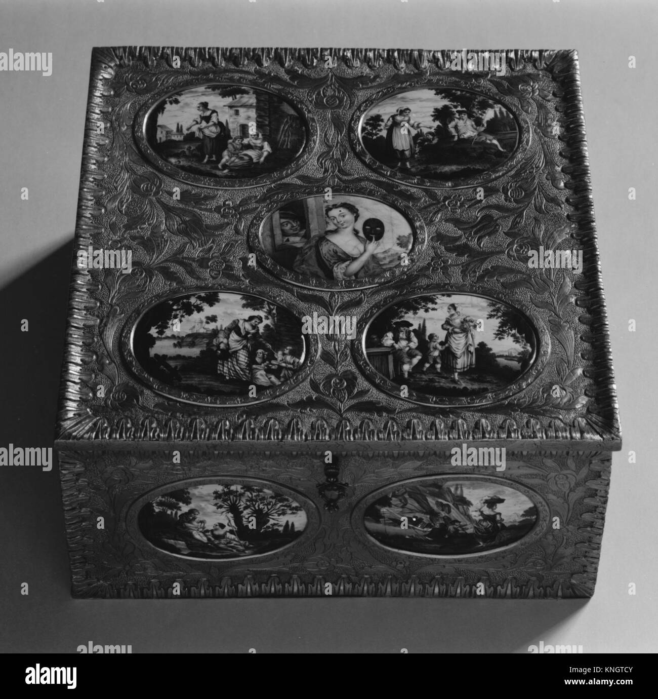 This ornate casket features intricate designs and detailed ...