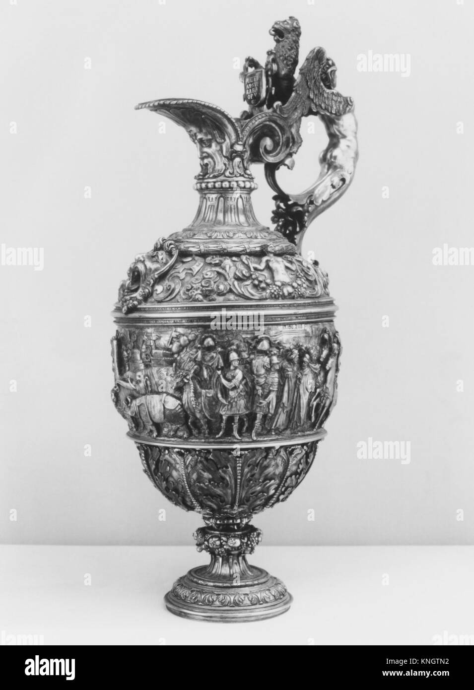 This metal ewer serves as a historical vessel for liquids ...