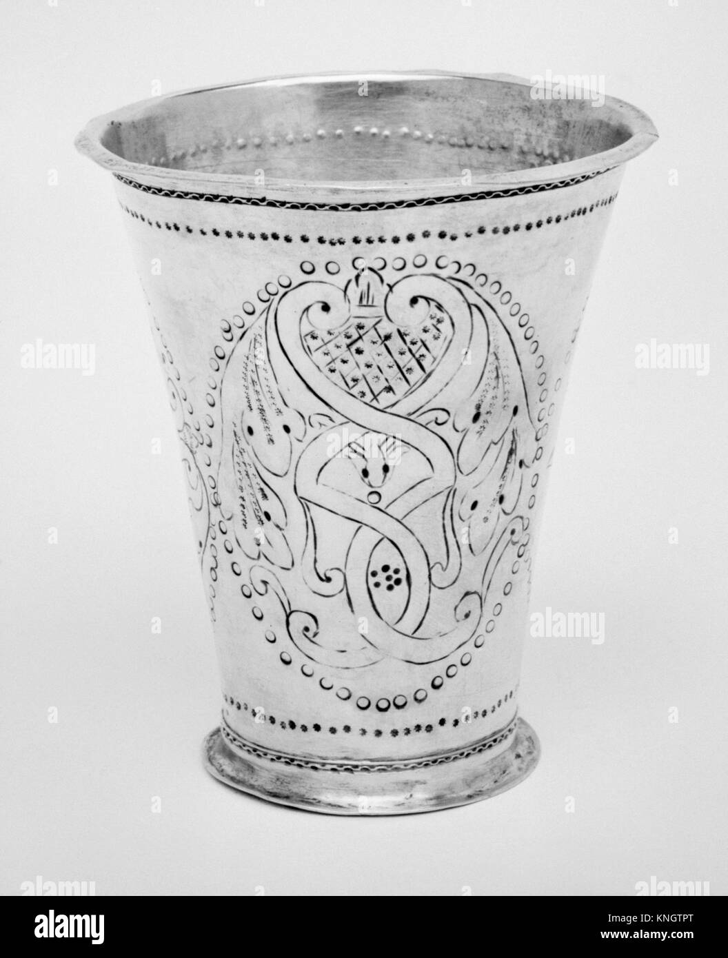 This beaker, cataloged as MET 97080, is a finely crafted drinking ...