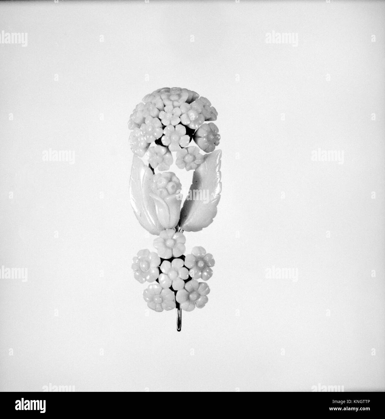 This earring, part of a parure, showcases intricate craftsmanship and ...