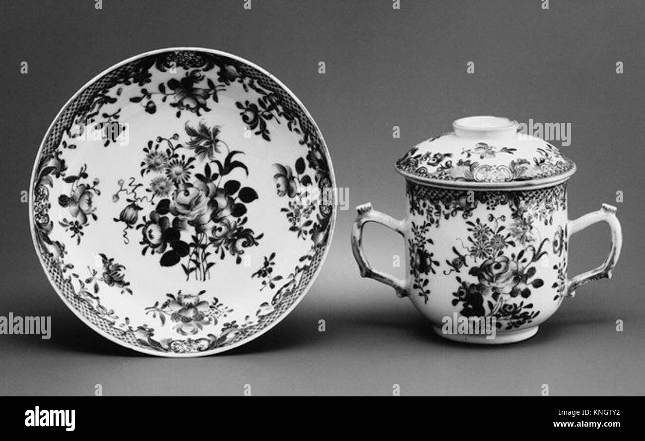 This cup with cover and saucer set features intricate designs and is a ...