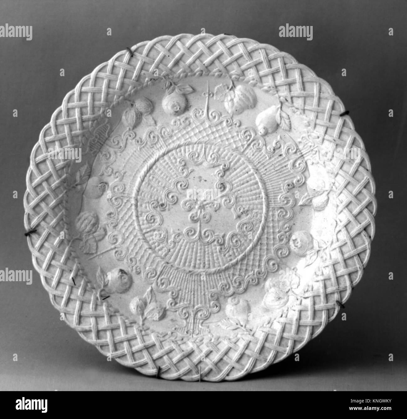 This dish is a ceramic or glassware piece, finely crafted, representing ...