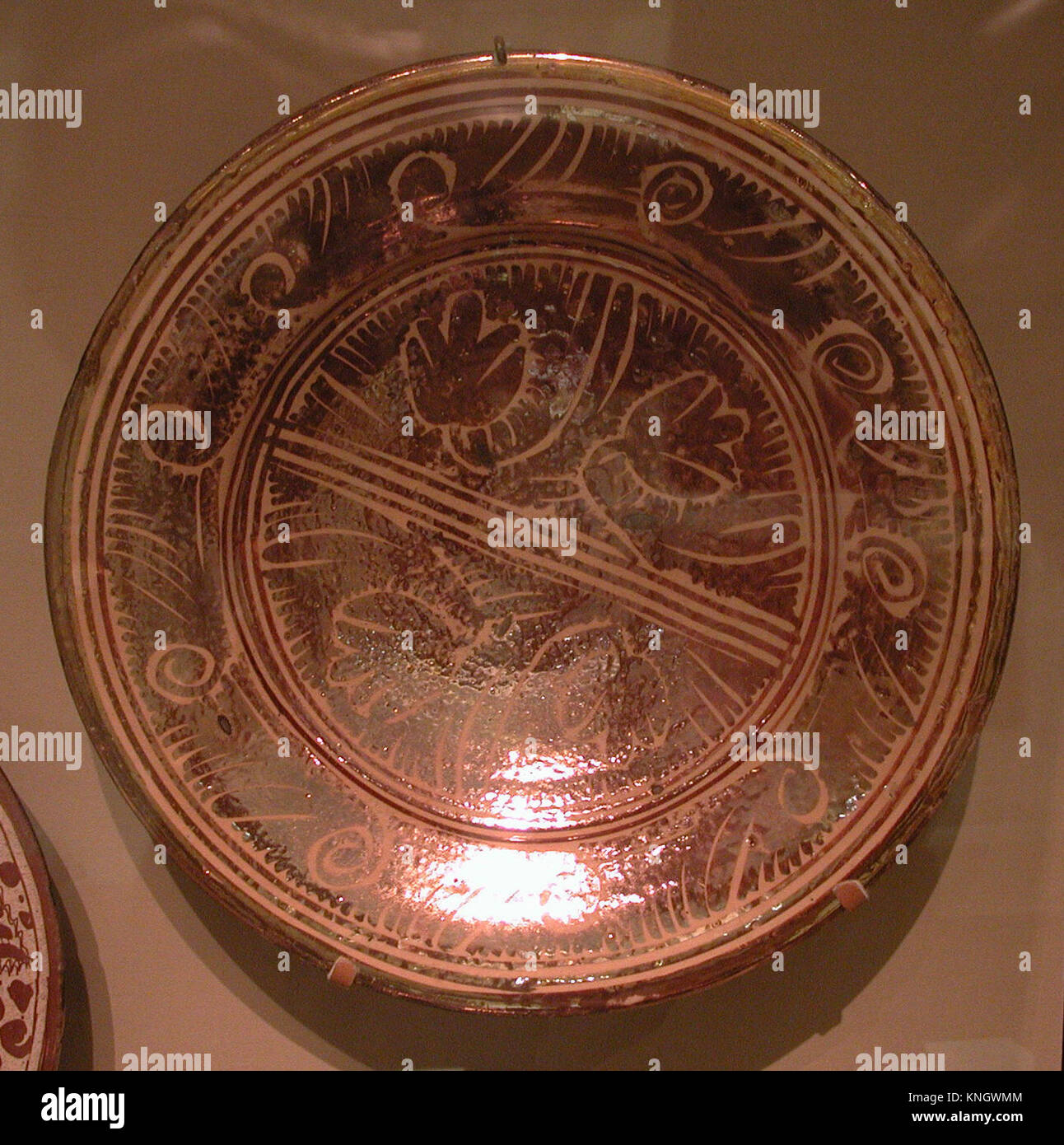 This dish is an example of decorative ceramic work, showcasing artistic ...