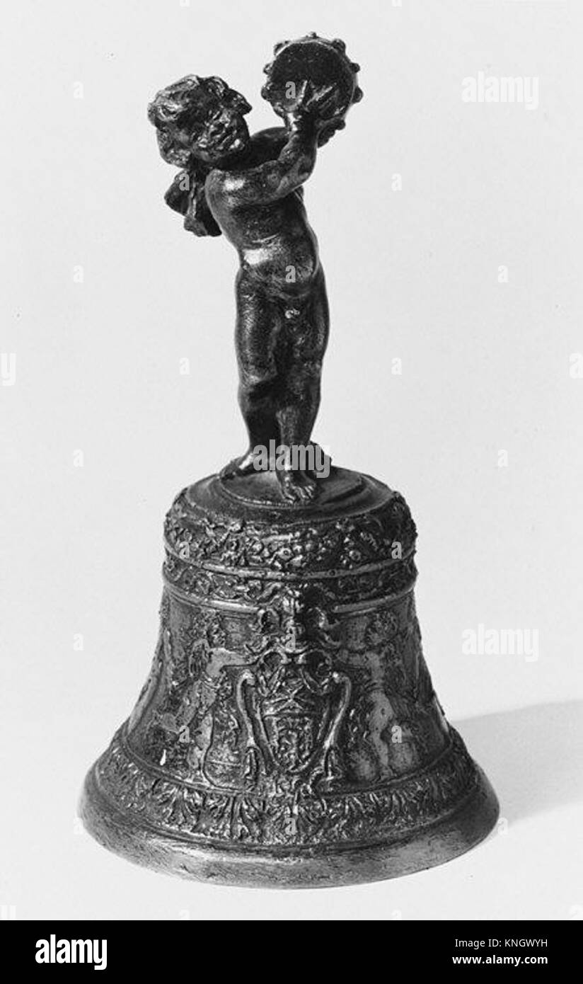 This bell, made of metal, represents a functional and decorative object ...