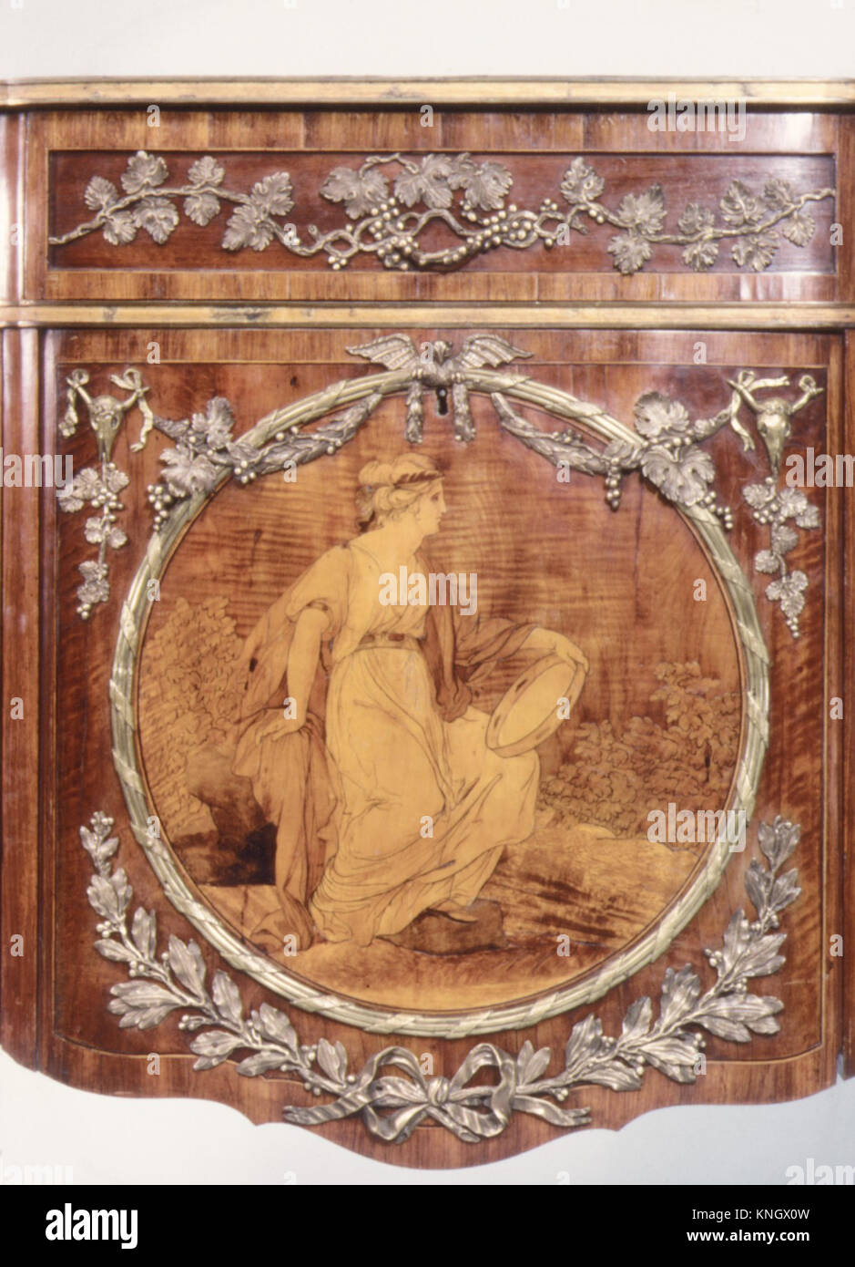 This commode, part of a furniture set, reflects 18th-century European ...