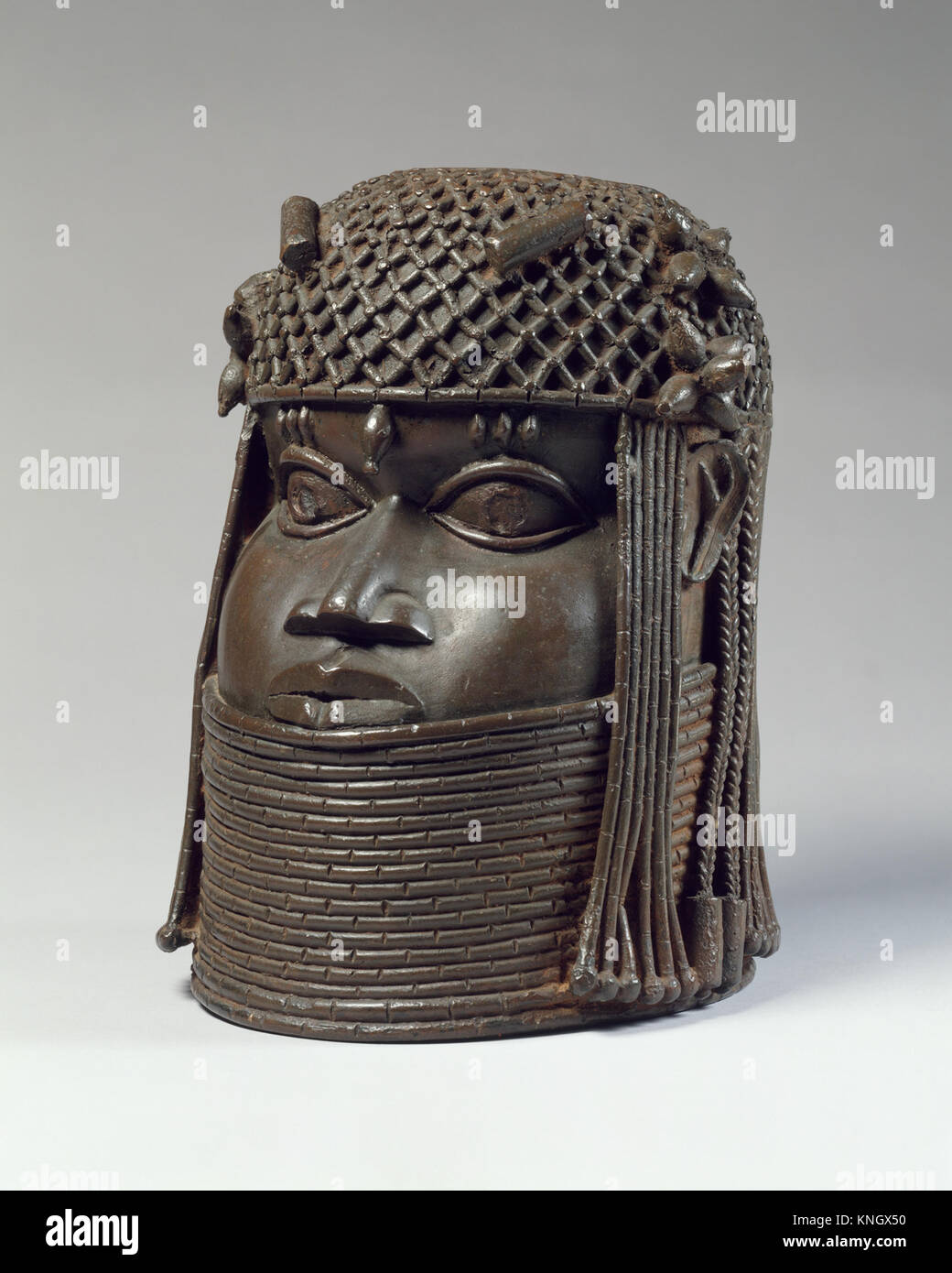This head of an Oba represents a detailed portrayal of a West African ...